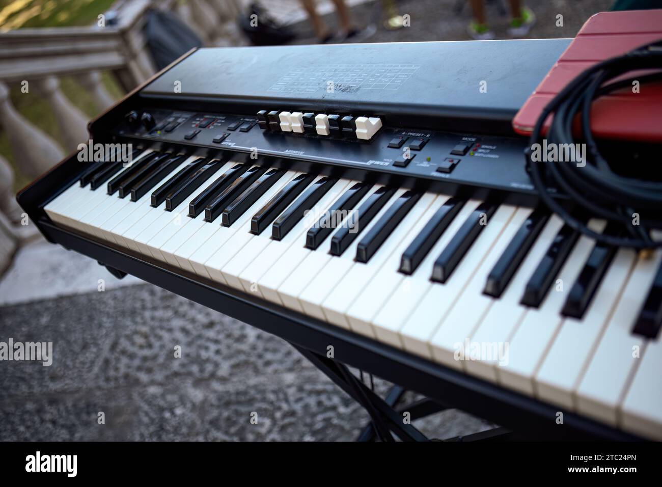 Detailed view of a keyboard, elegantly poised and ready for an exciting ...