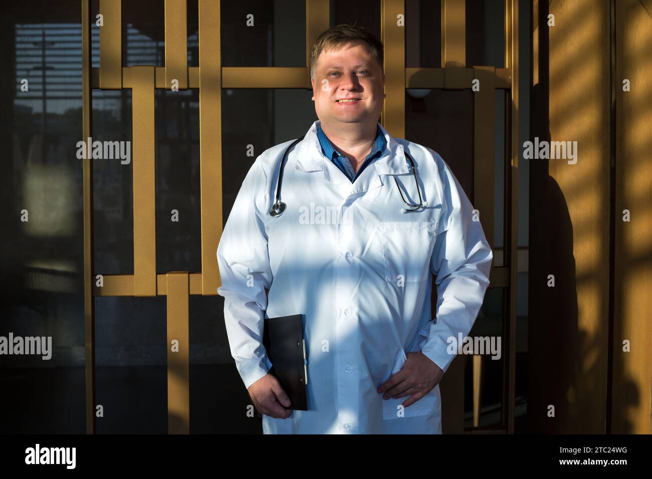 Head doctor of the hospital in the new renovated hospital full length ...