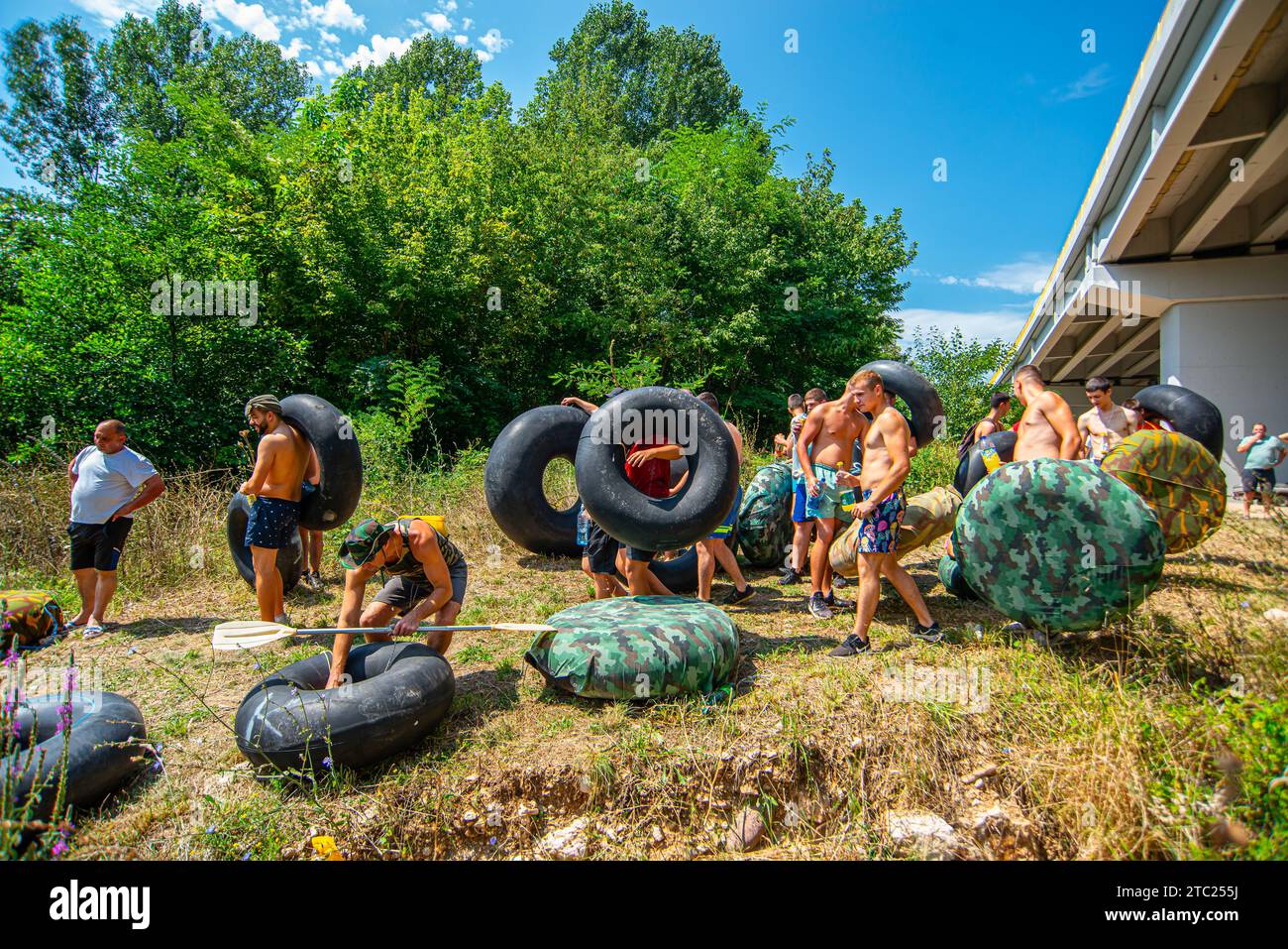 20 August 2023 Nisava river, Serbia, Group of young people enjoy river ...