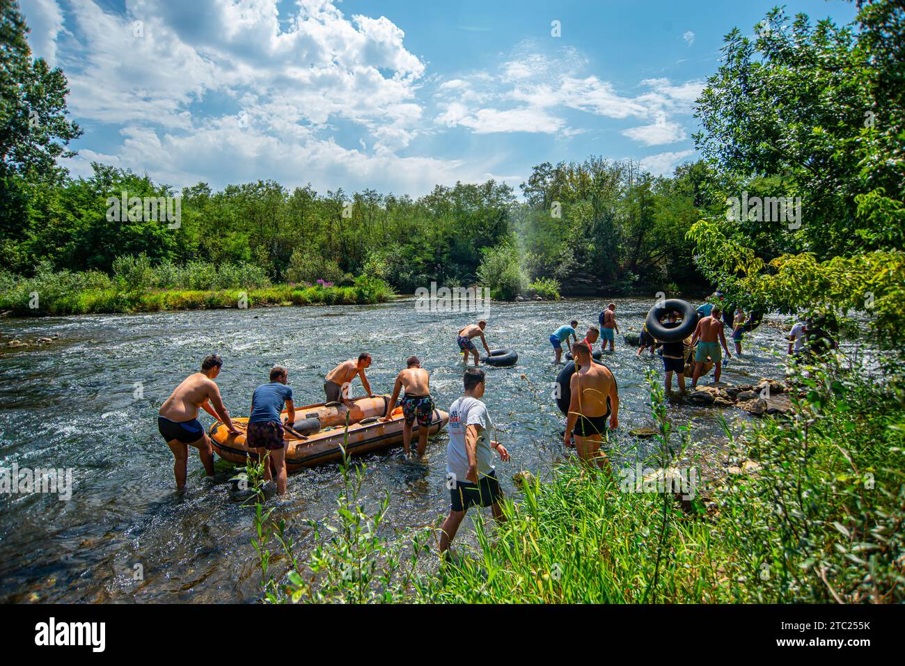 20 August 2023 Nisava river, Serbia, Group of young people enjoy river ...
