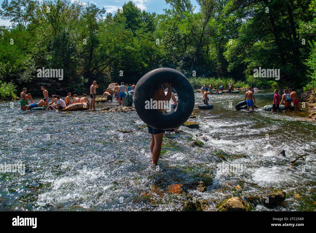 20 August 2023 Nisava river, Serbia, Group of young people enjoy river ...