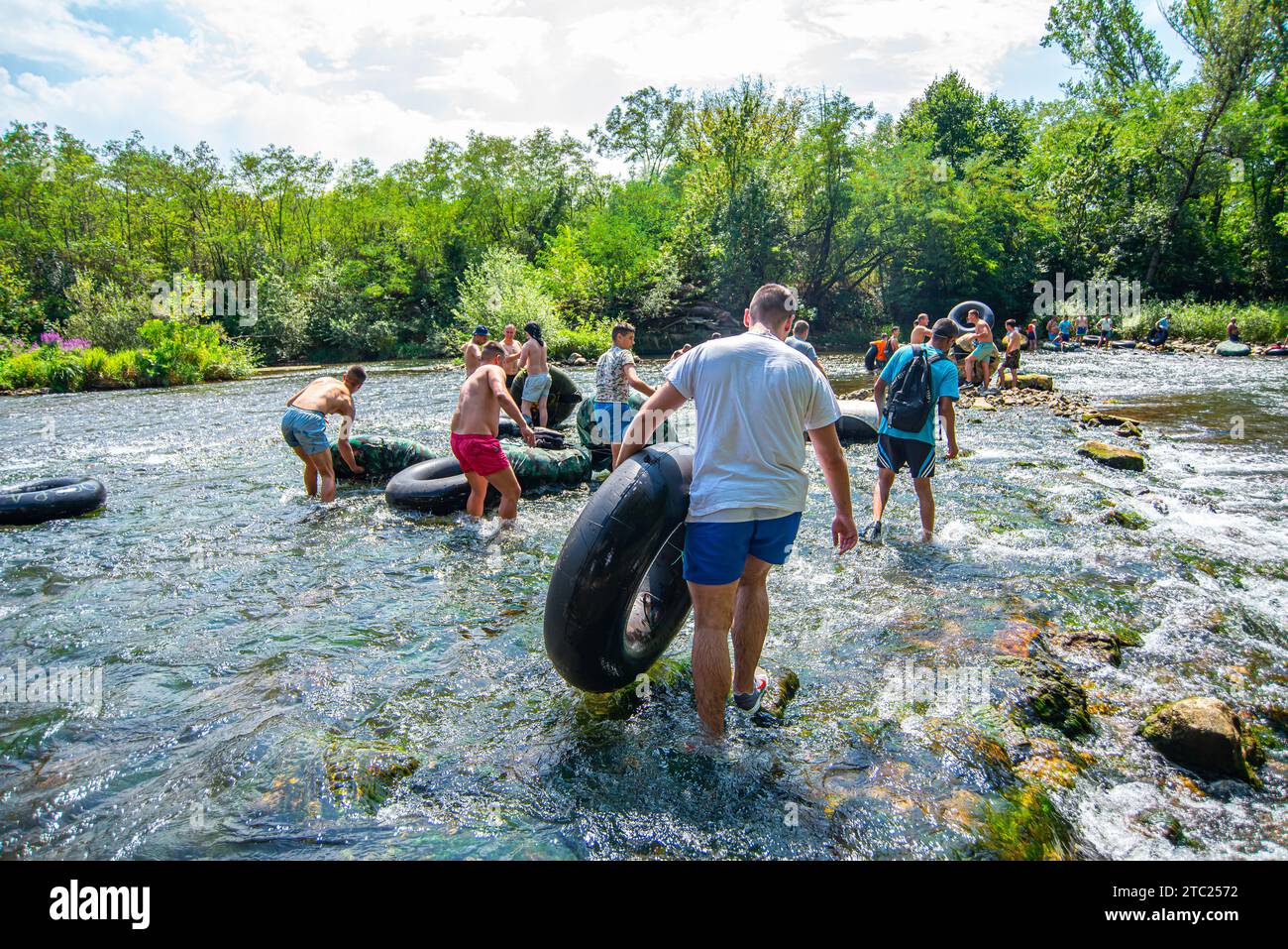 20 August 2023 Nisava river, Serbia, Group of young people enjoy river ...