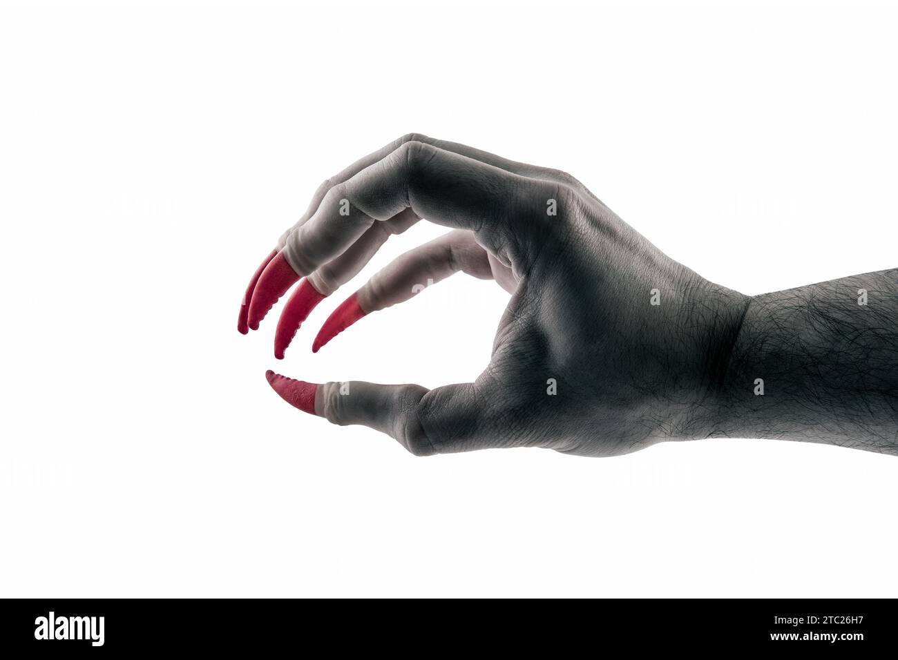 Creepy monster hand with red claws isolated on white background with ...