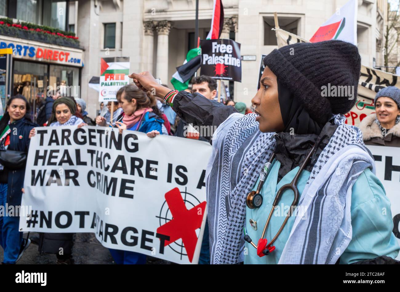 London, UK. 9 Dec 2023: A muslim nurse and healthcarev workers at a ...