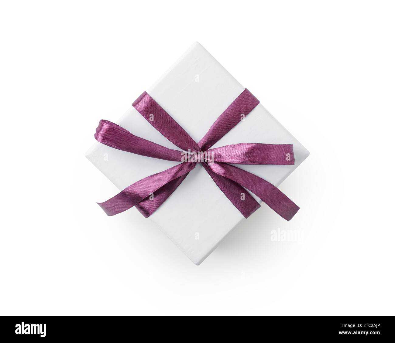 Top view of white gift box with violet ribbon isolated on white ...