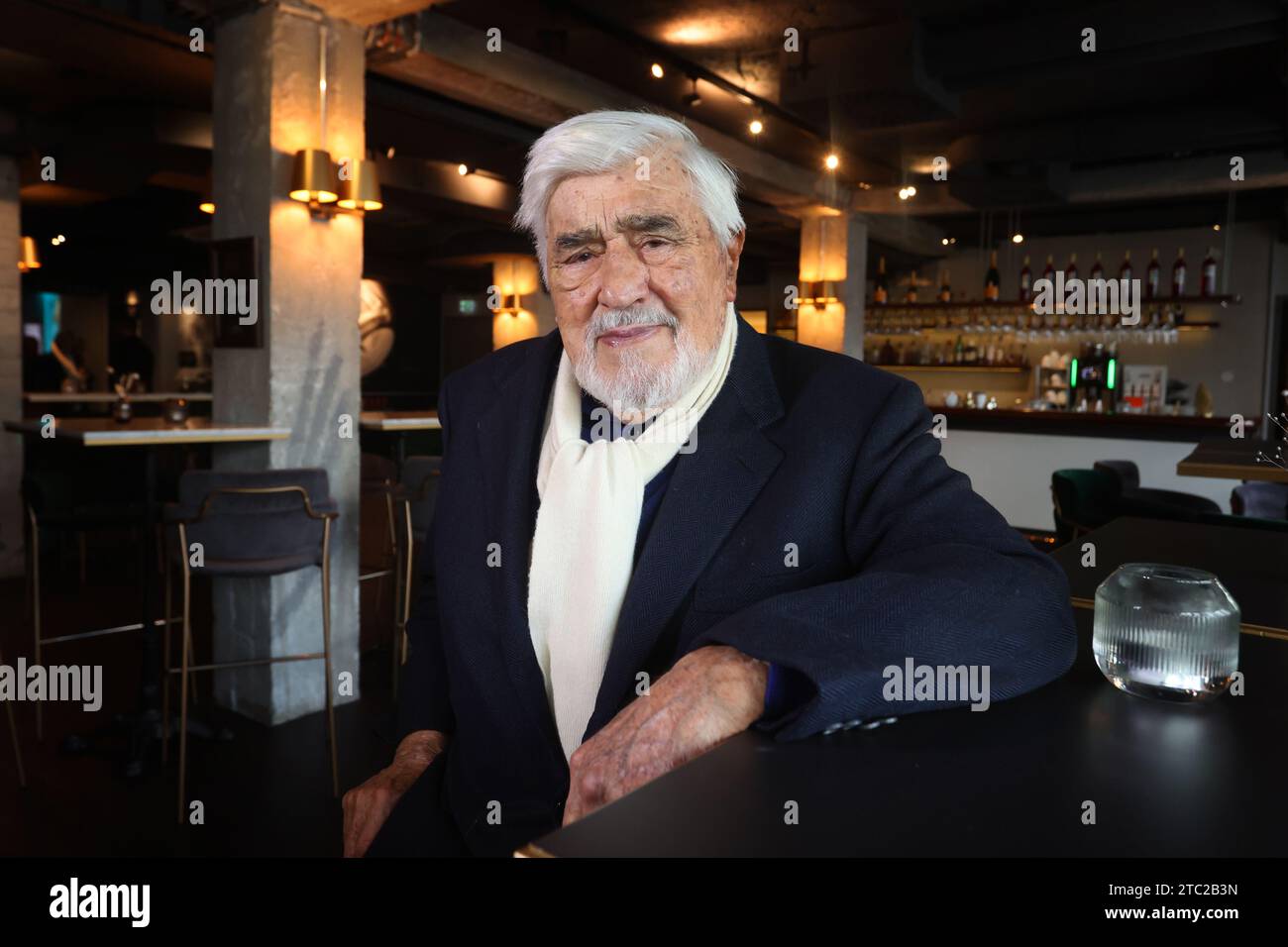 Munich, Germany. 10th Dec, 2023. Mario Adorf, actor, sits before the ...