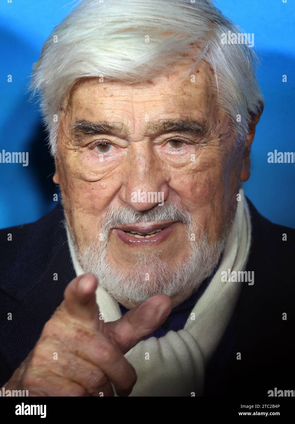 Munich, Germany. 10th Dec, 2023. Actor Mario Adorf stands on the red ...