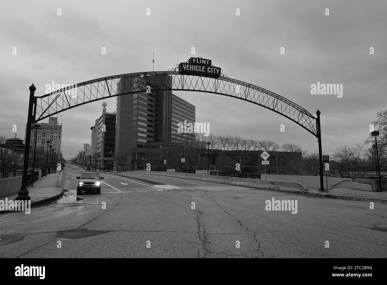Saginaw Street in Flint Michigan, with Flint Vehicle City arch and sign ...