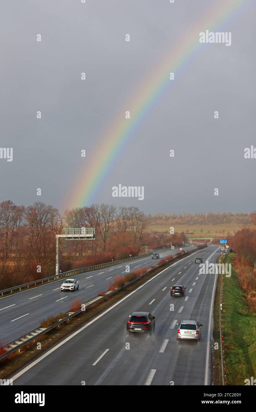 Ilsenburg, Germany. 10th Dec, 2023. A rainbow stands over the A36 ...