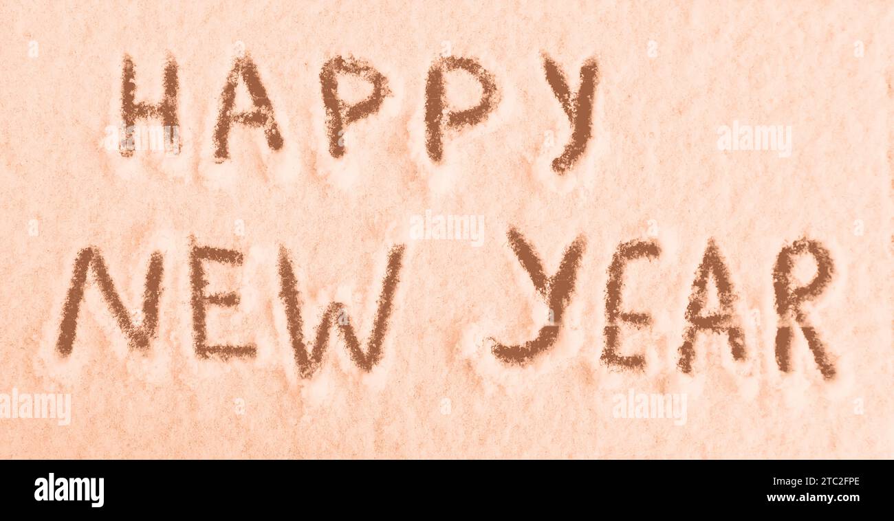 Happy New Year words written on the surface of a snow field. Color of ...