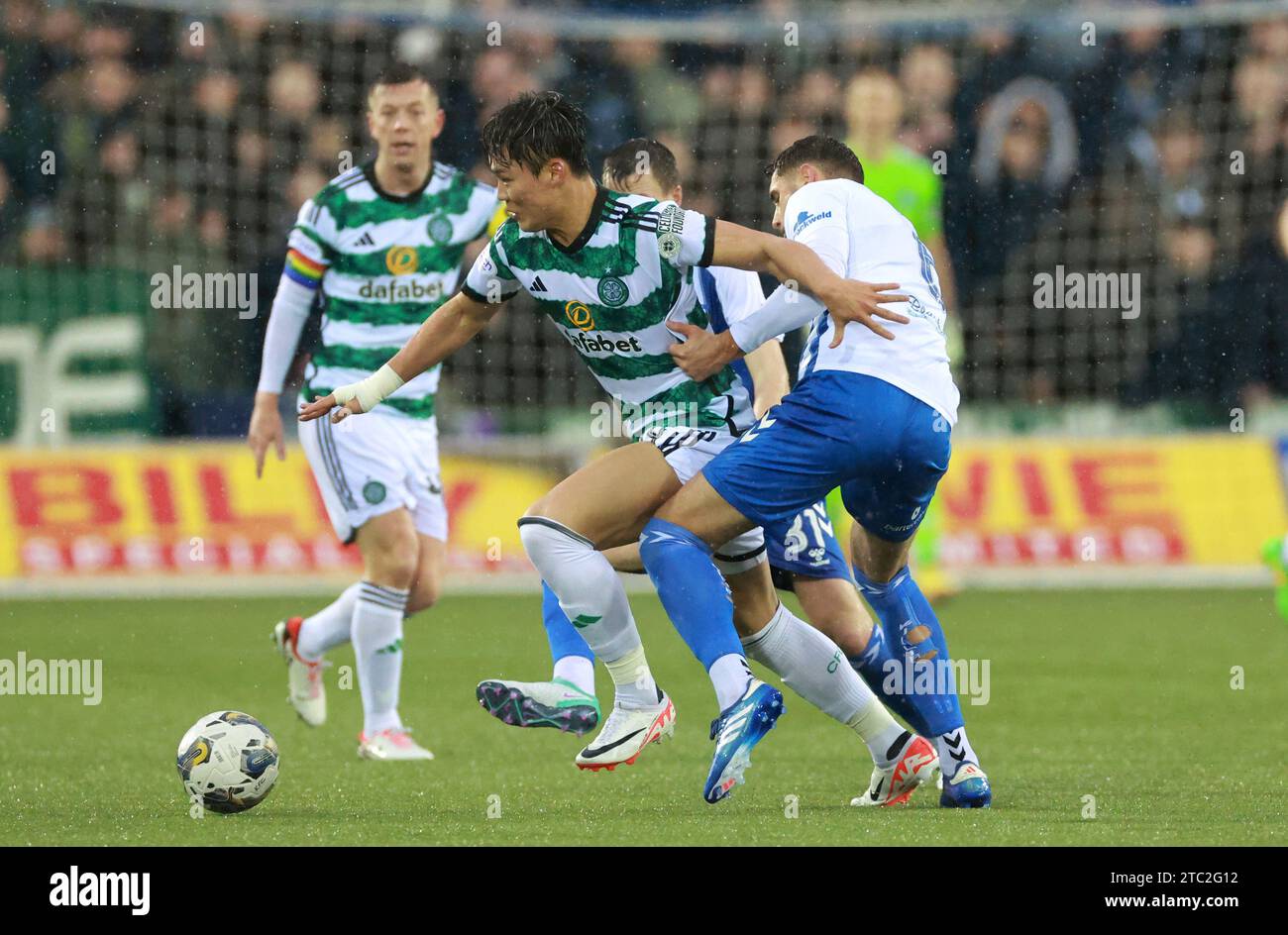 Celtic's Oh Hyeon-Gyu (left) and Kilmarnock's Robbie Deas battle for ...