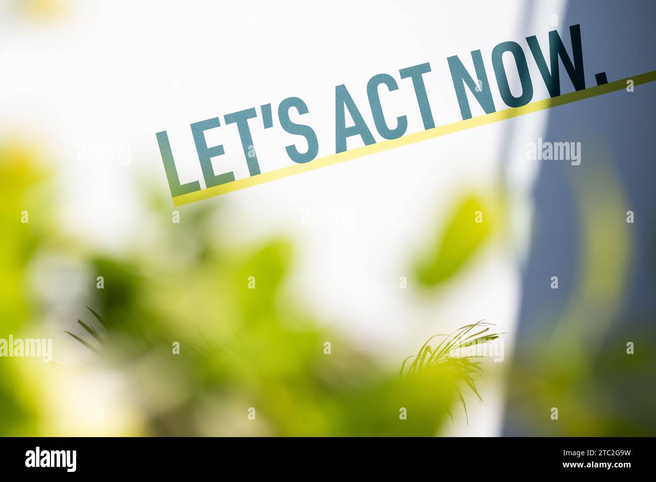 Dubai, United Arab Emirates. 10th Dec, 2023. ""Let's Act Now."" is ...
