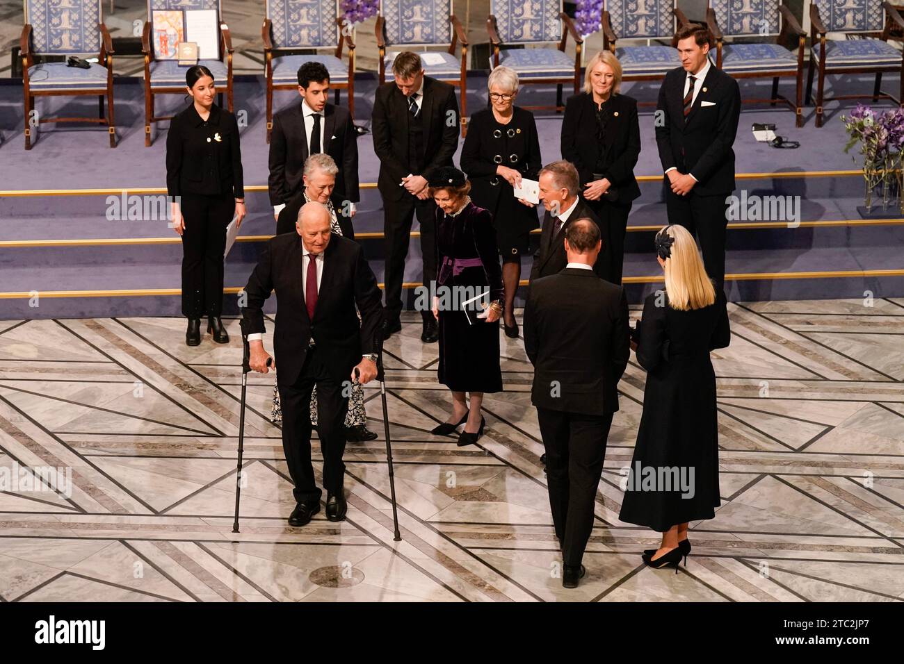 Oslo 20231210.King Harald (f.v.) greets Ali and Kiani Rahmani after the ...