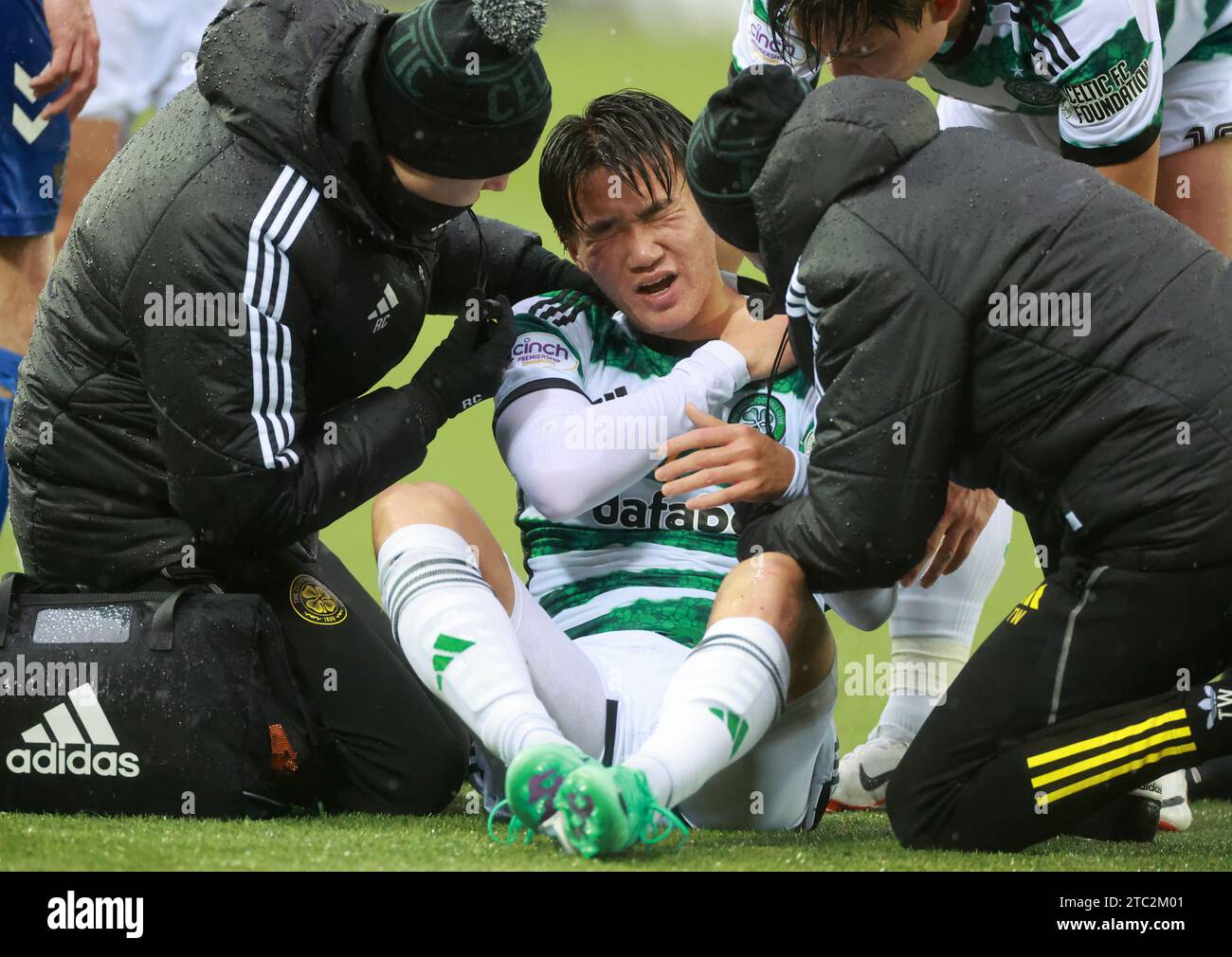 Celtic's Yang Hyun-Jun receives medical attention during the cinch ...