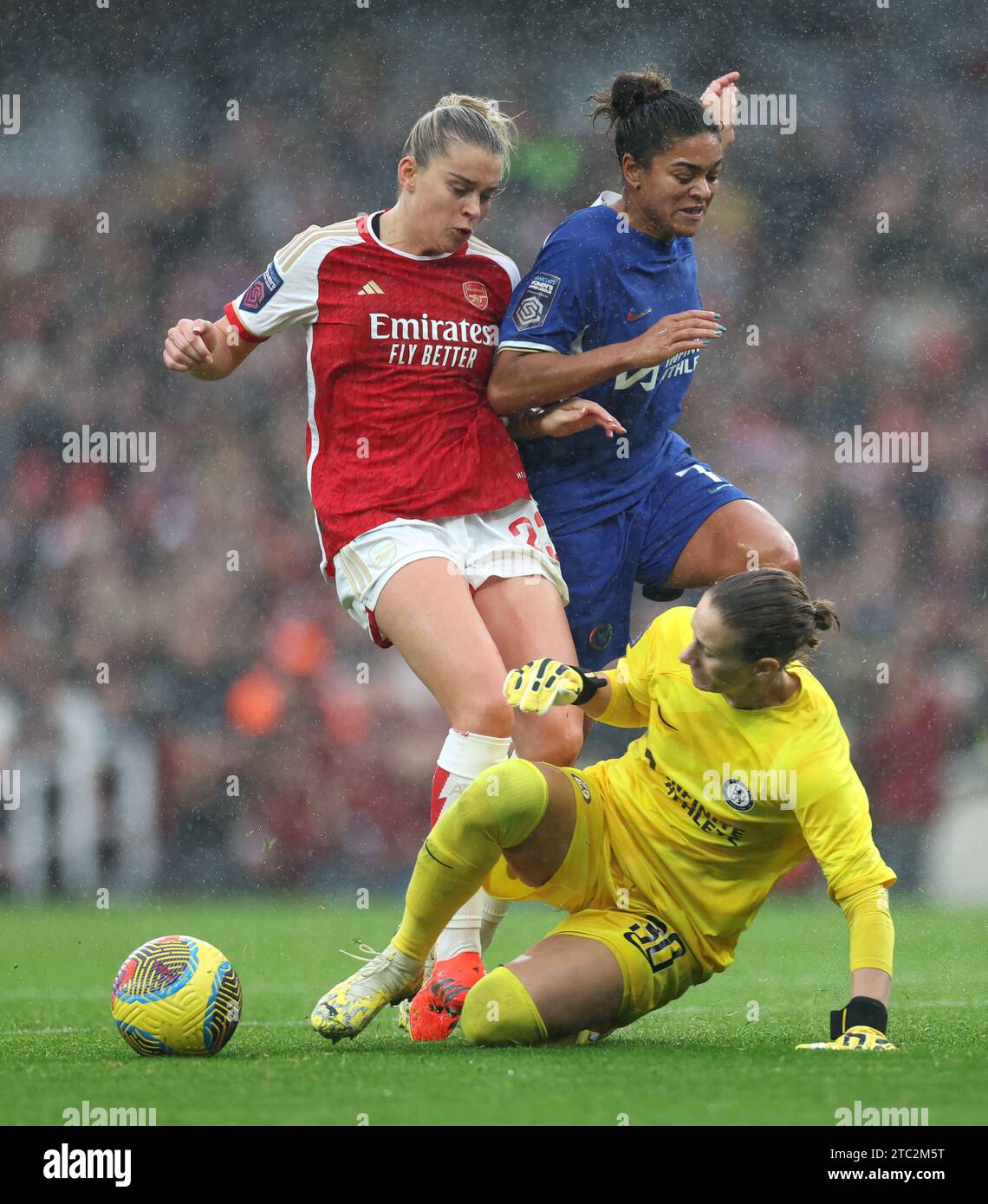 Arsenal's Alessia Russo fouled by Chelsea's Jess Carter and goalkeeper ...