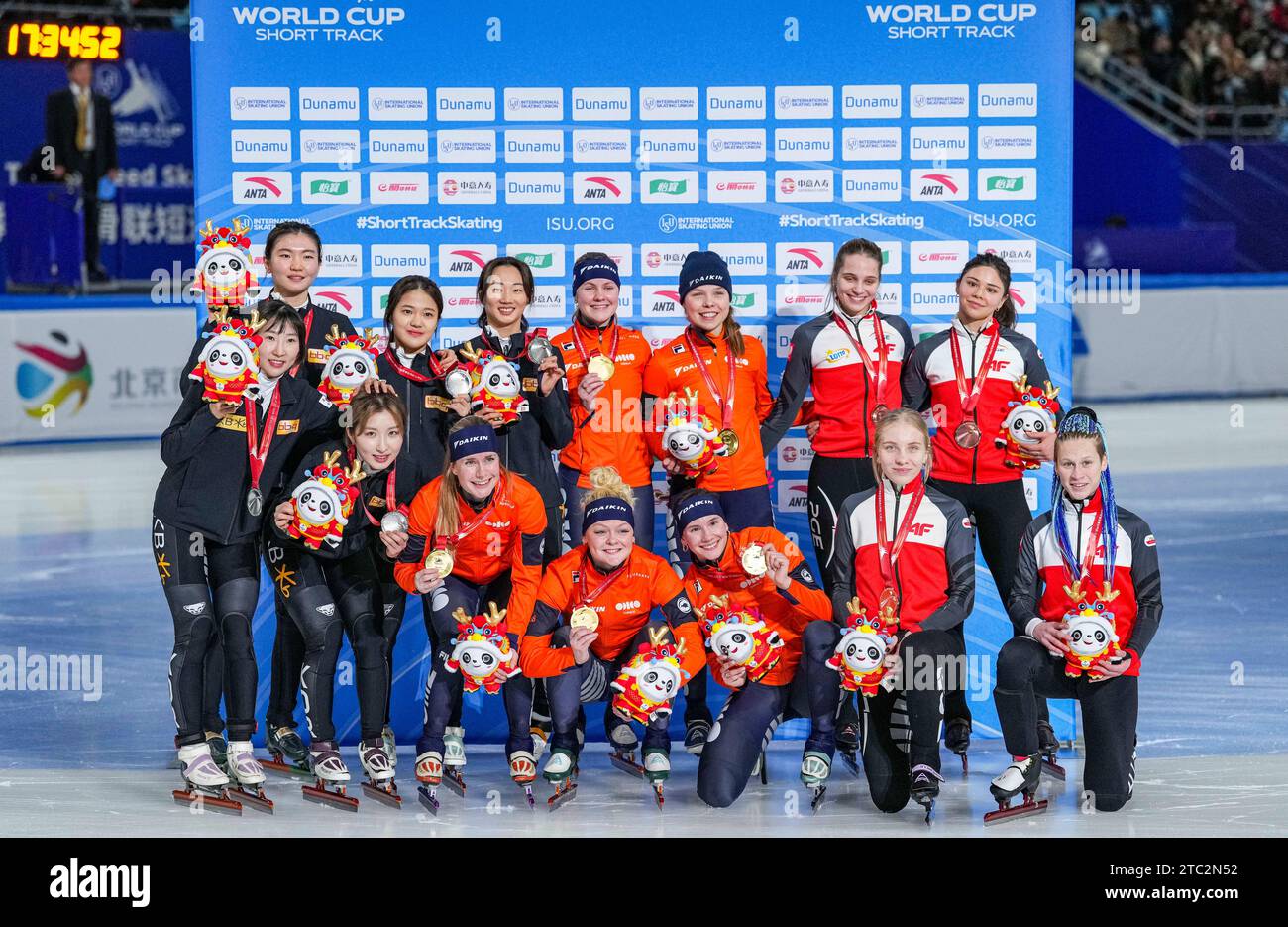 Beijing, China. 10th Dec, 2023. Gold medalists team Netherlands (C), silver medalists team South ...