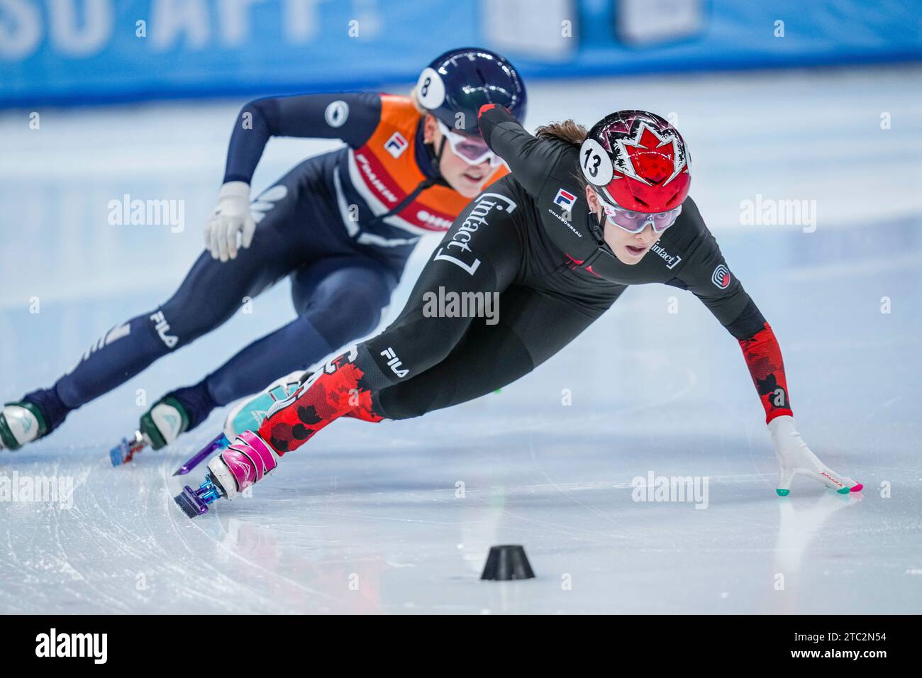 Beijing, China. 10th Dec, 2023. Danae Blais (R) of Canada competes ...