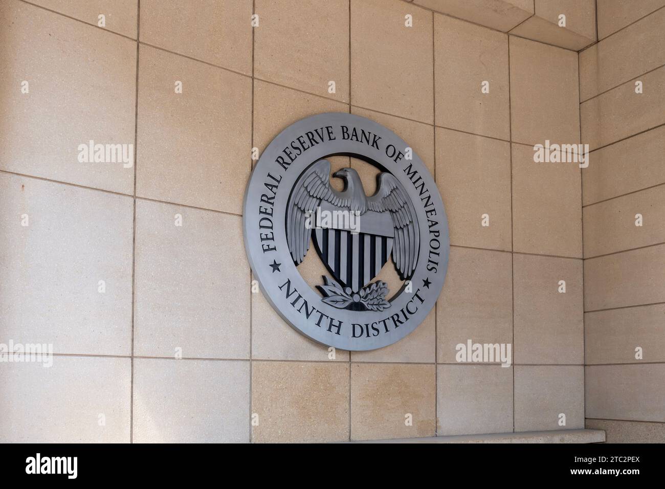 The seal of Federal Reserve Bank of Minneapolis at headquarters in Minneapolis, Minnesota, USA ...