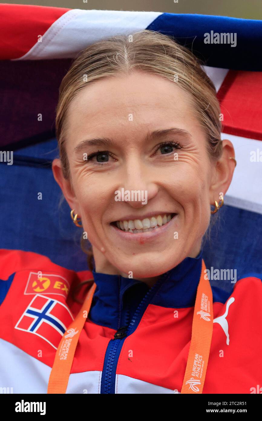 Norway's Karoline Bjerkeli Grovdal celebrates after crossing the finish ...