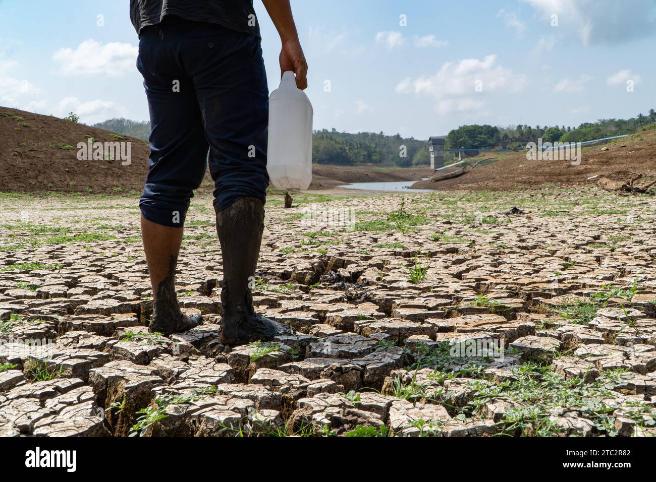 a man looks for water in the midst of the El-Nino climate disaster ...