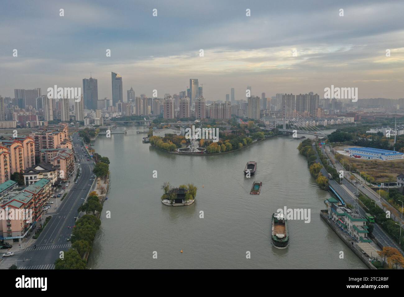 (231210) -- WUXI, Dec. 10, 2023 (Xinhua) -- This aerial photo taken on Dec. 9, 2023 shows a view ...