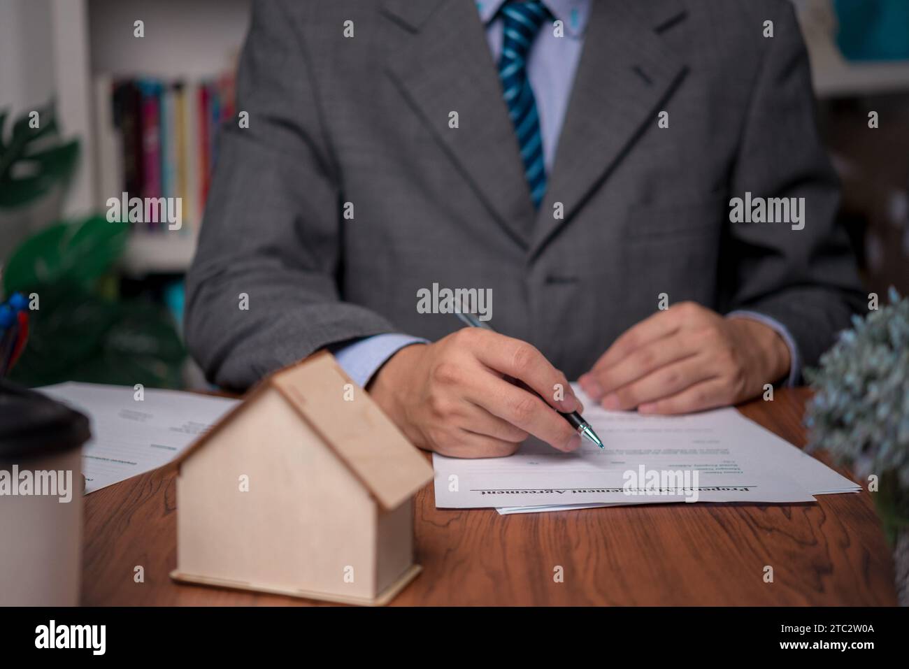 Business person Writing contract law and paper work for business and ...