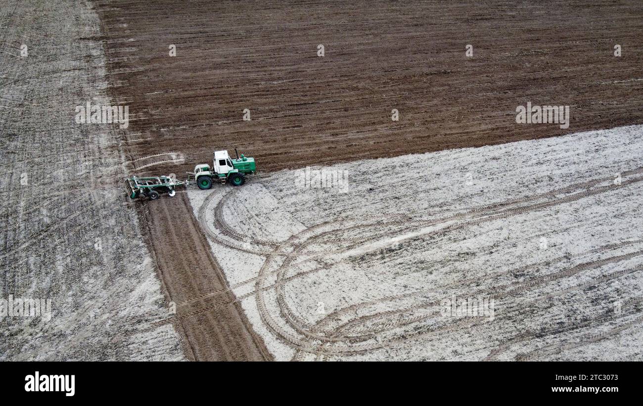 Aerial view agricultural tractor plows hi-res stock photography and ...