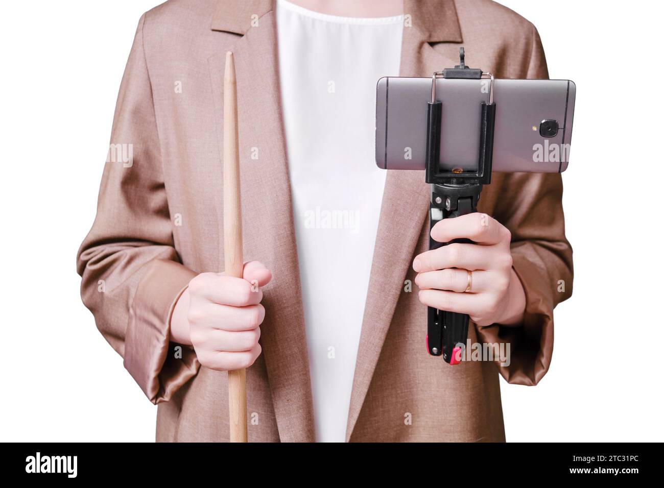 Woman teacher with phone for online lesson on studio isolated on a ...