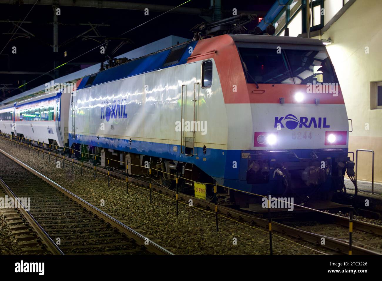 The Korail Mugunghwa train departs a station, its arrival marking the ...