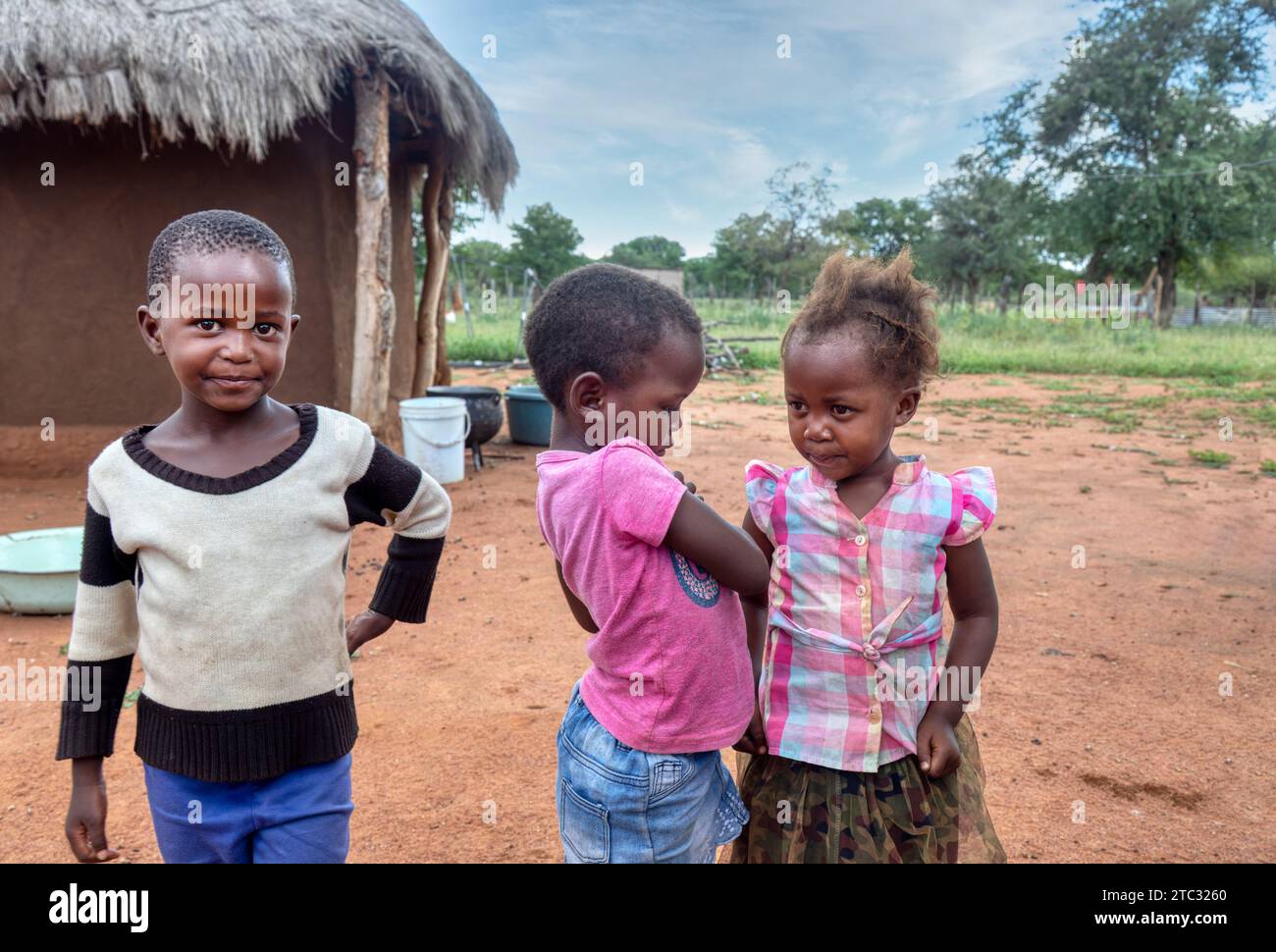 village african kids, playing in the yard , three siblings Stock Photo ...