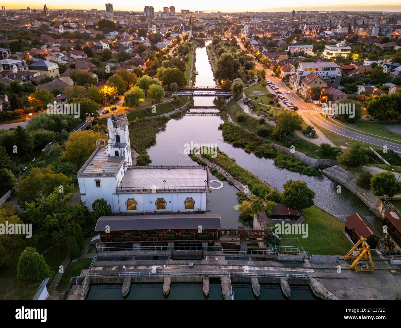 Aerial view of Bega River shore during a dramatic orange sunset. Drone ...