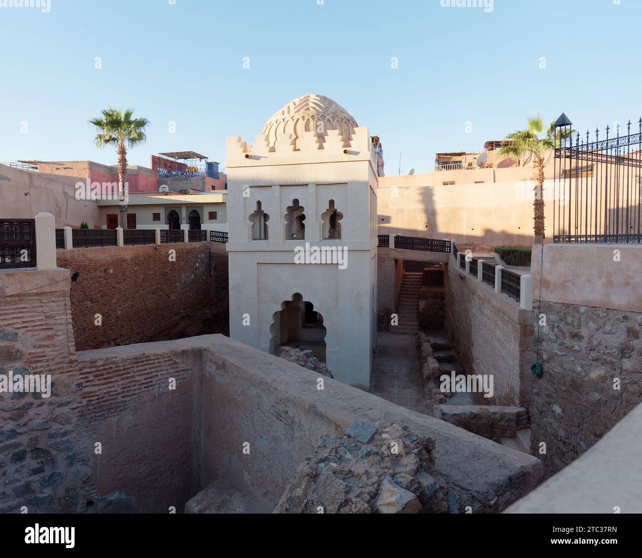 Ruins and a tower in the city of Marrakesh aka Marrakech with Mosque in ...