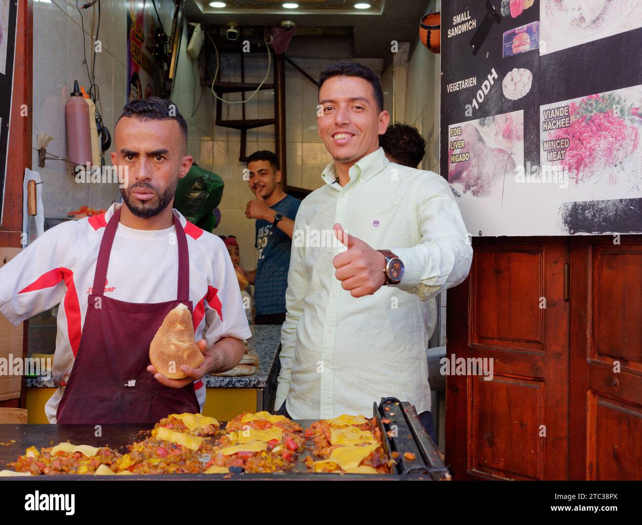 Fast food Shop worker gives thumbs up Marrakesh aka Marrakech with ...