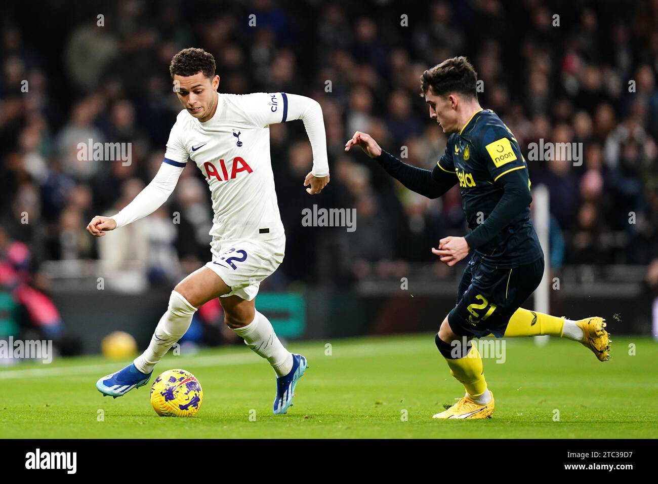 Tottenham Hotspur's Brennan Johnson (left) and Newcastle United's Tino ...