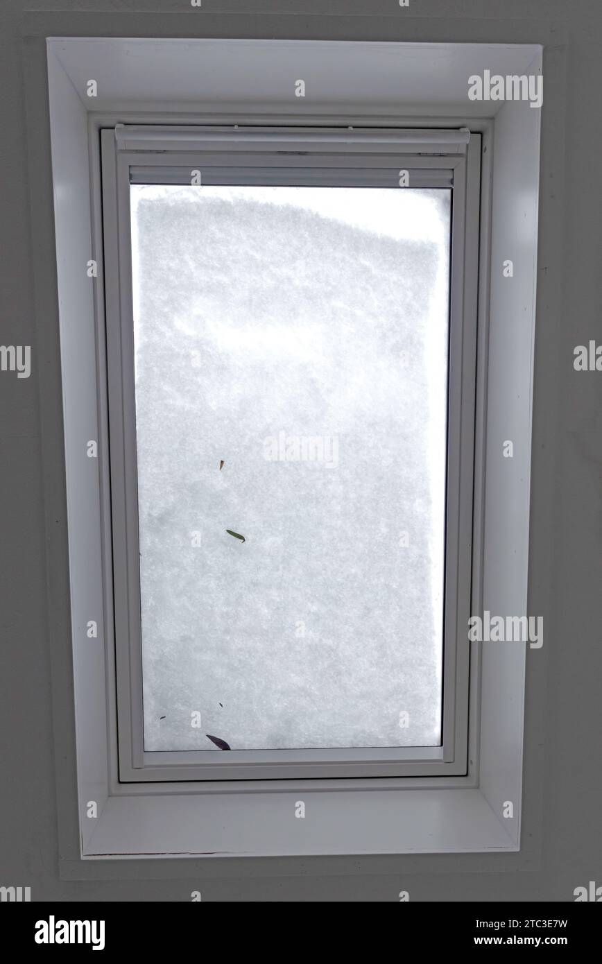 Melted snow on the roof window hi-res stock photography and images - Alamy