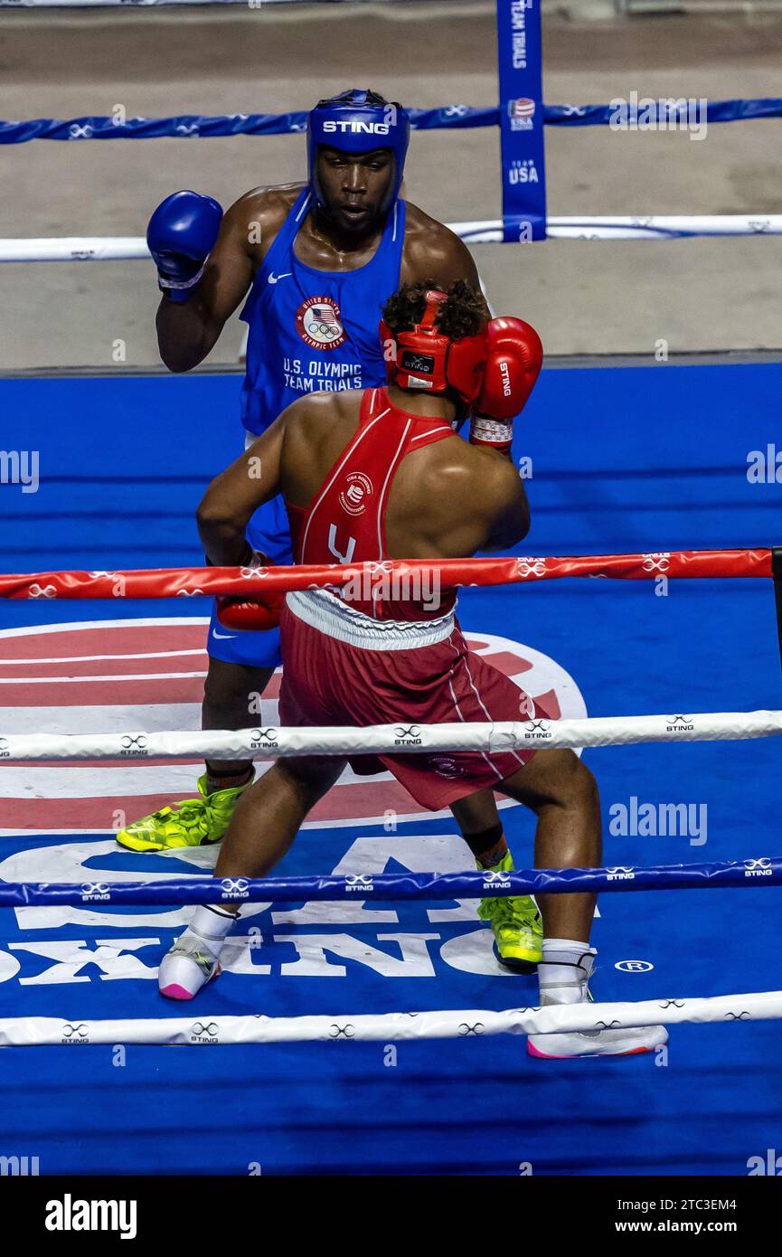 Ali Feliz (red) fights Steven Williams (blue) during the Olympic Boxing ...