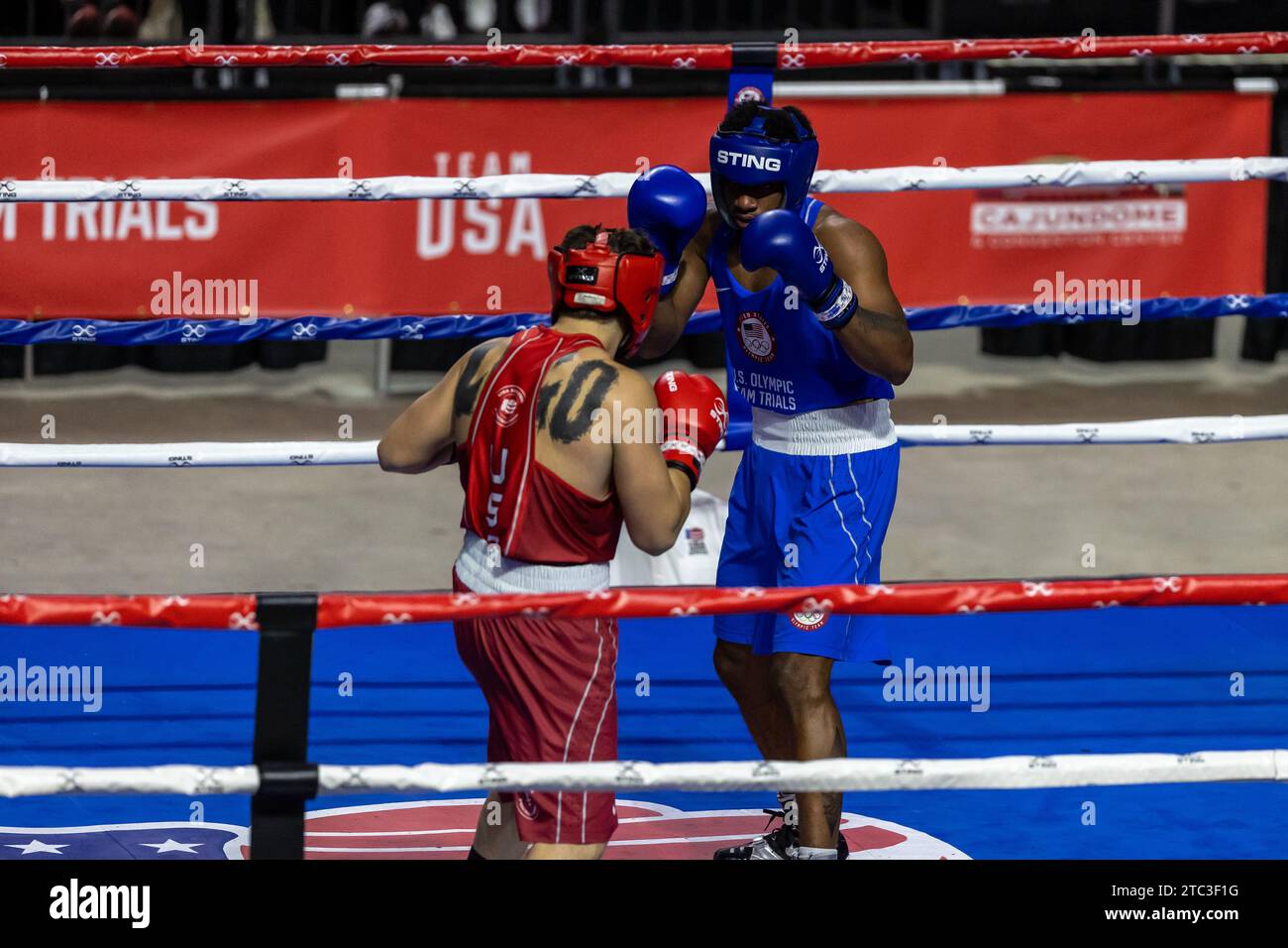 Nathan Lugo (red) fights Obed Bartee-El (blue) during the Olympic ...