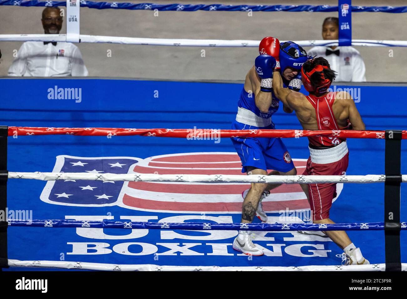 Jordan Fuentes (red) fights Isaias Estevan Navarro (blue) during the ...