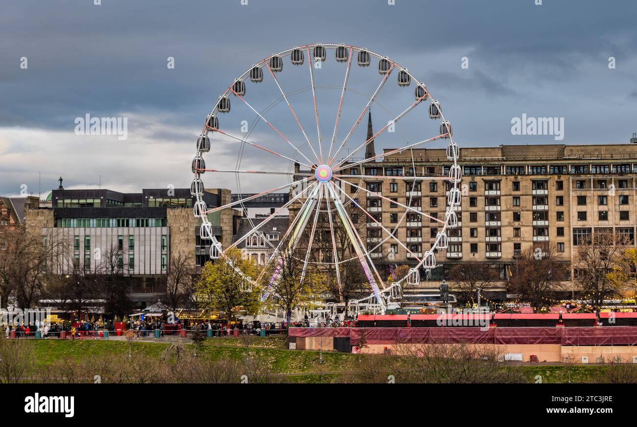 View of the big ferris wheel at Christmas market, Edinburgh, Scotland ...