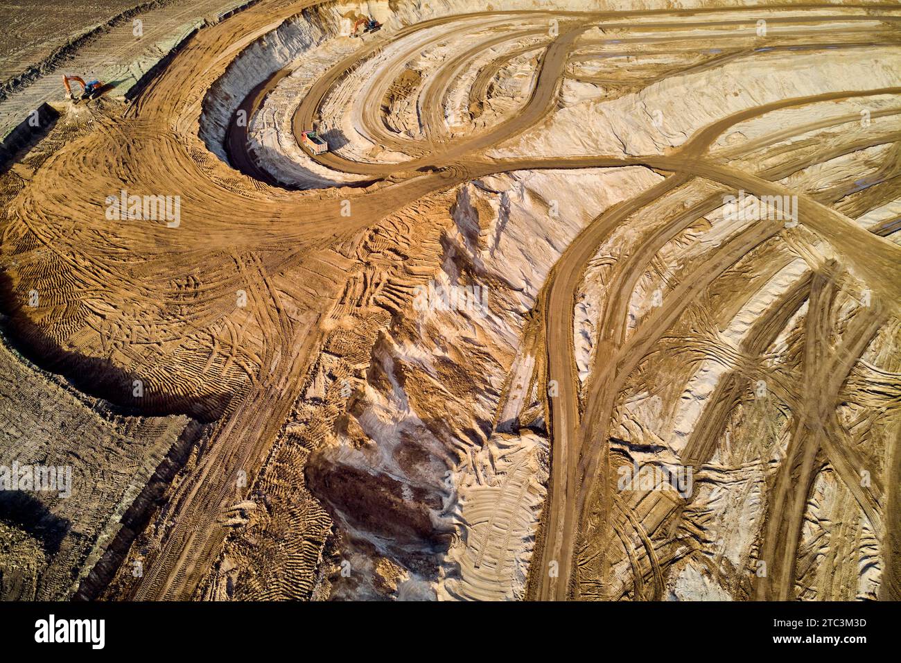 Aerial view of the patterns of roads on a sand quarry. Extraction of ...
