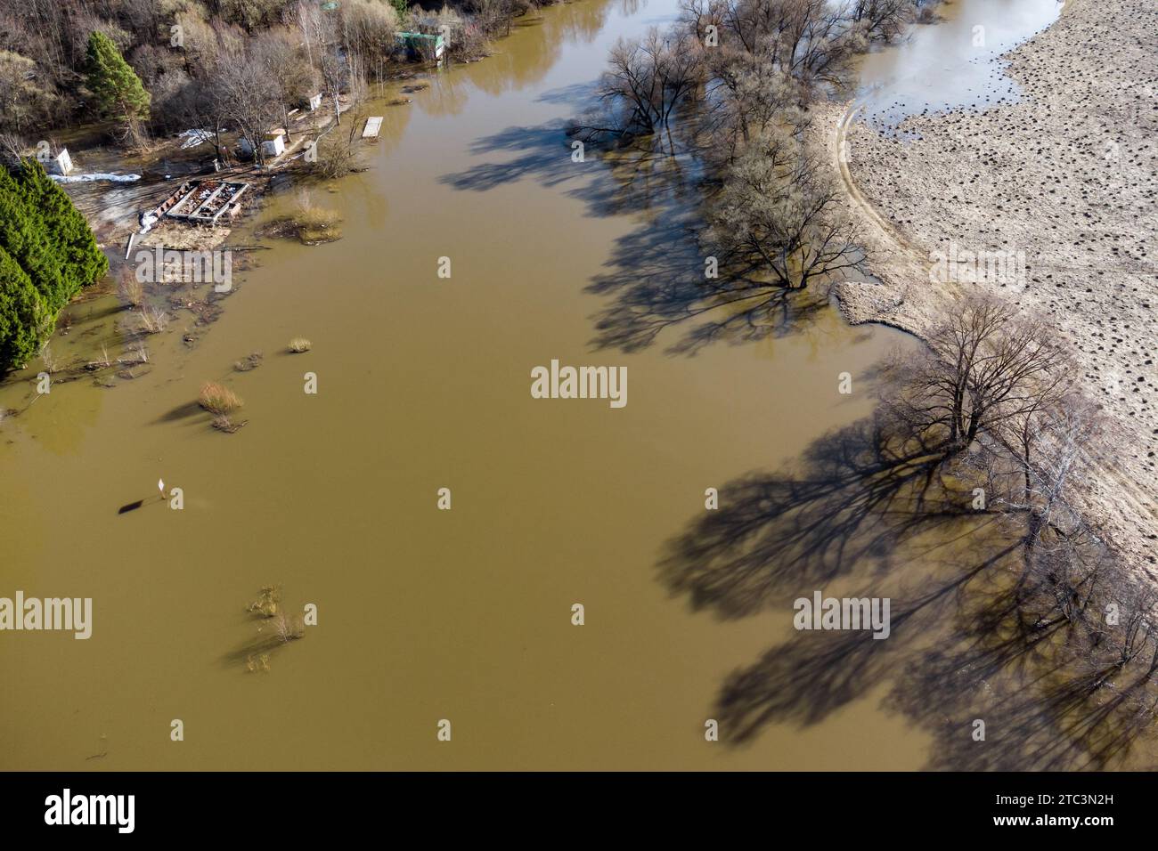 Drone view of an overflowing river during spring floods Stock Photo - Alamy