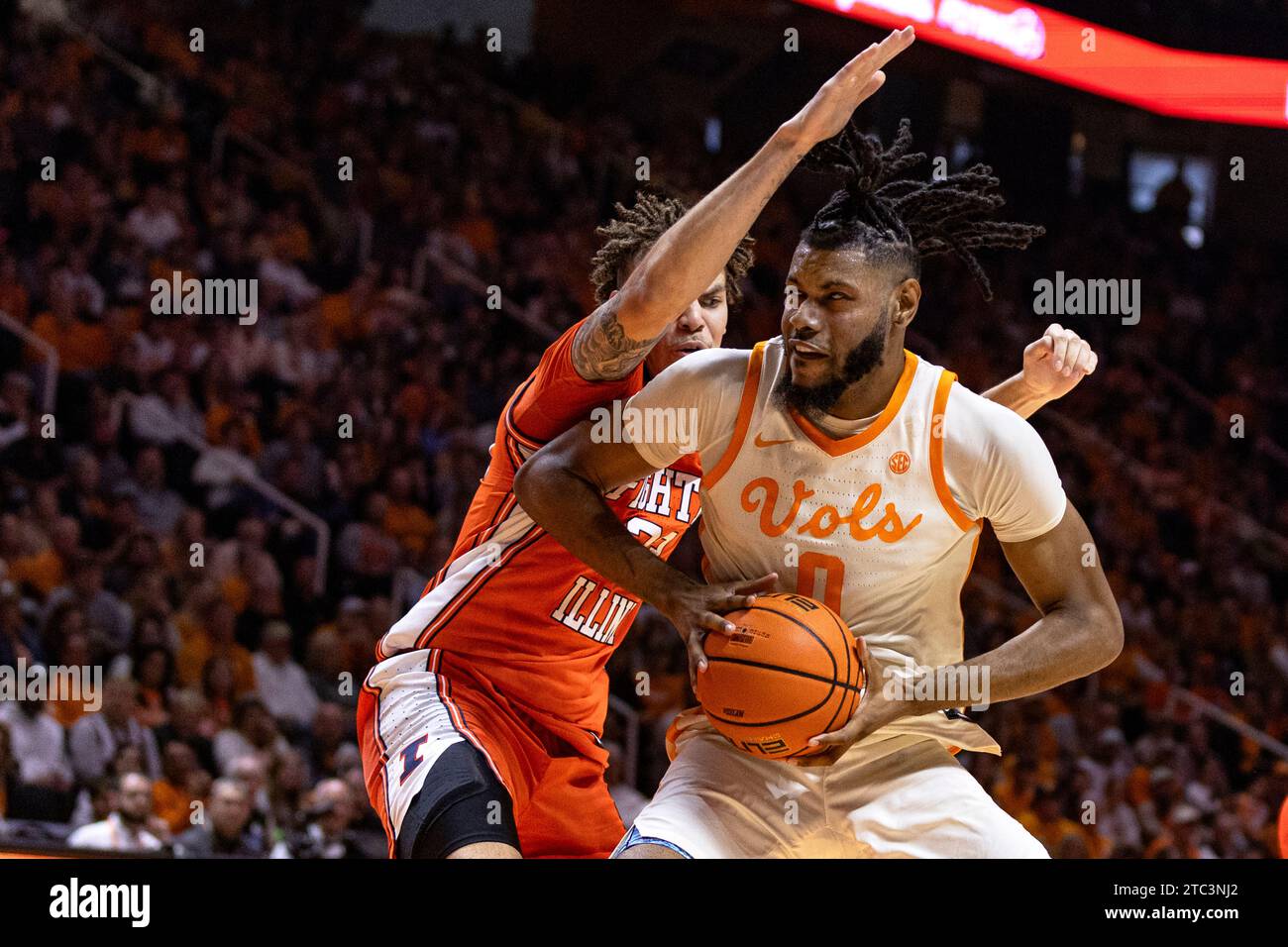 Tennessee forward Jonas Aidoo (0) goes for a shot against Illinois ...