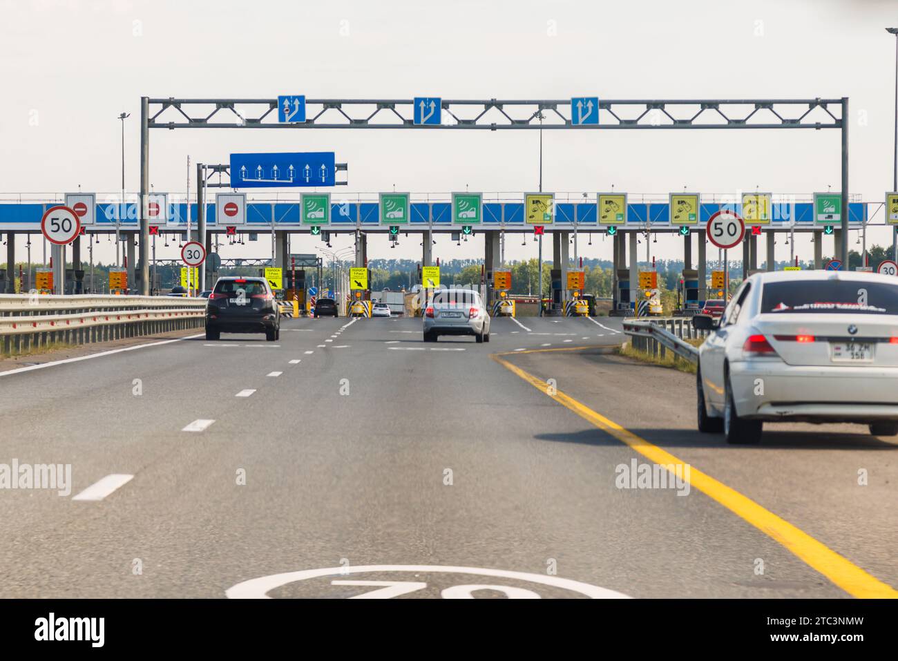cars approaching to checkpoint on toll road Stock Photo - Alamy