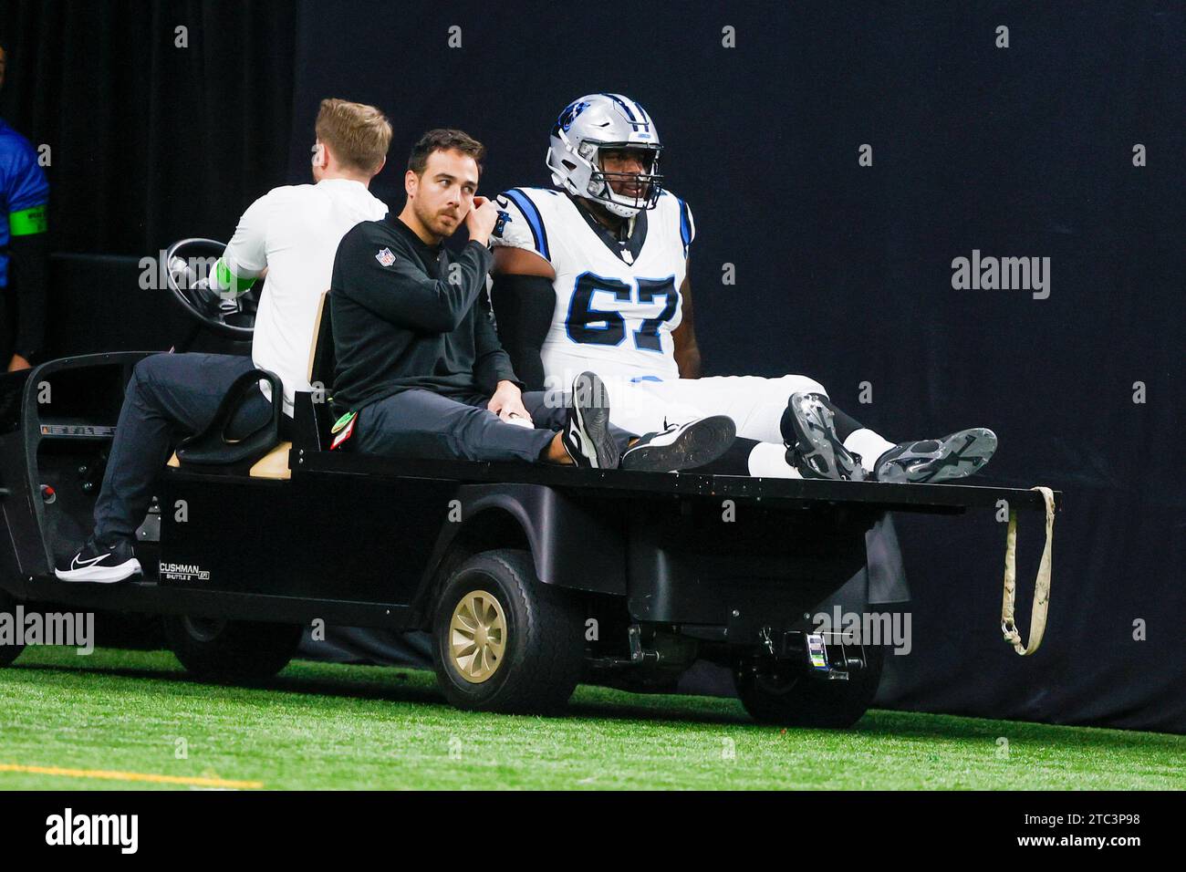 Carolina Panthers guard Justin McCray leaves the field after getting ...
