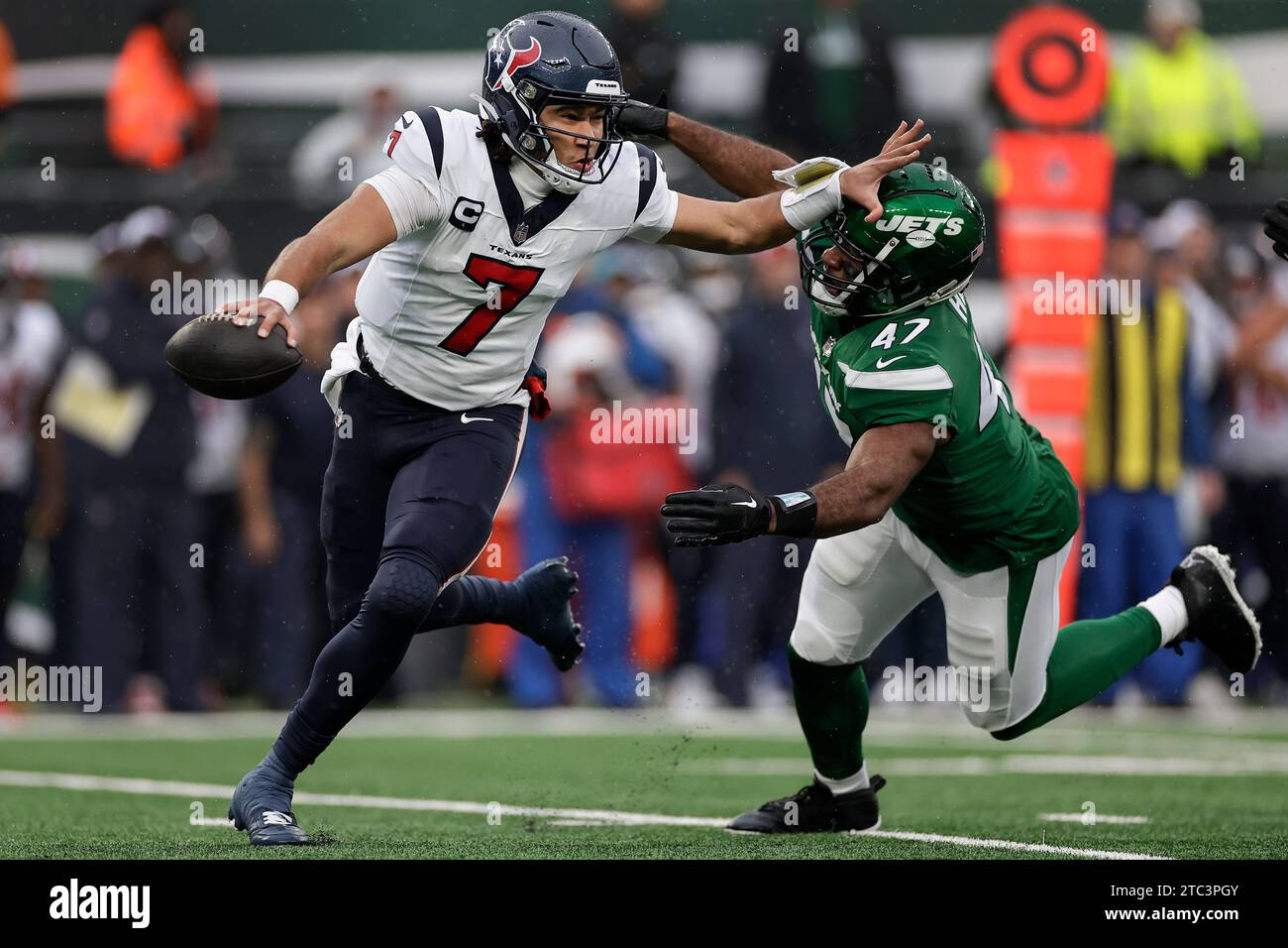 Houston Texans quarterback C.J. Stroud (7) rolls out of the pocket ...