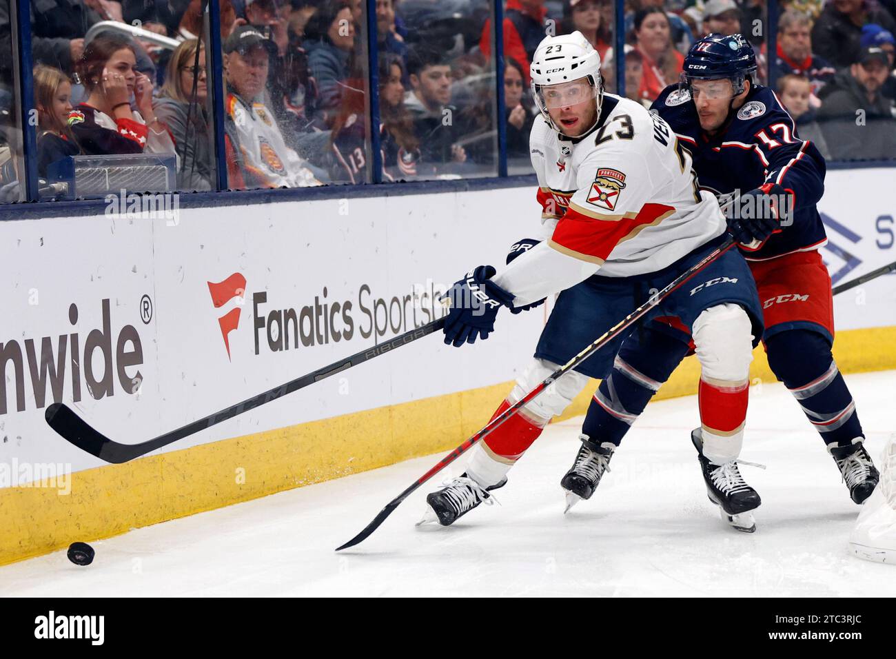 Florida Panthers forward Carter Verhaeghe, left, chases the puck in ...