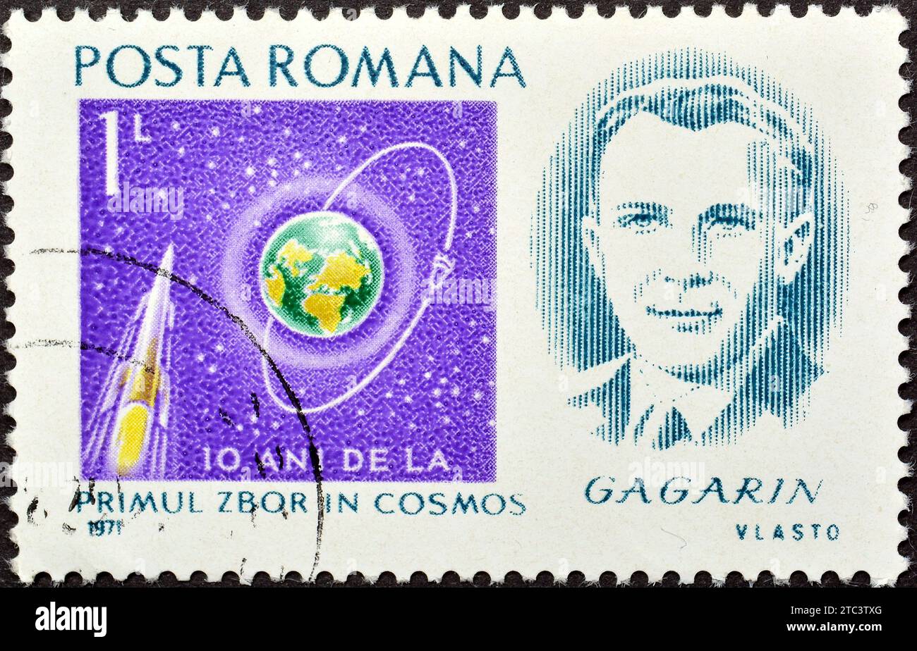 Cancelled postage stamp printed by Romania, that shows Gagarin, rocket ...