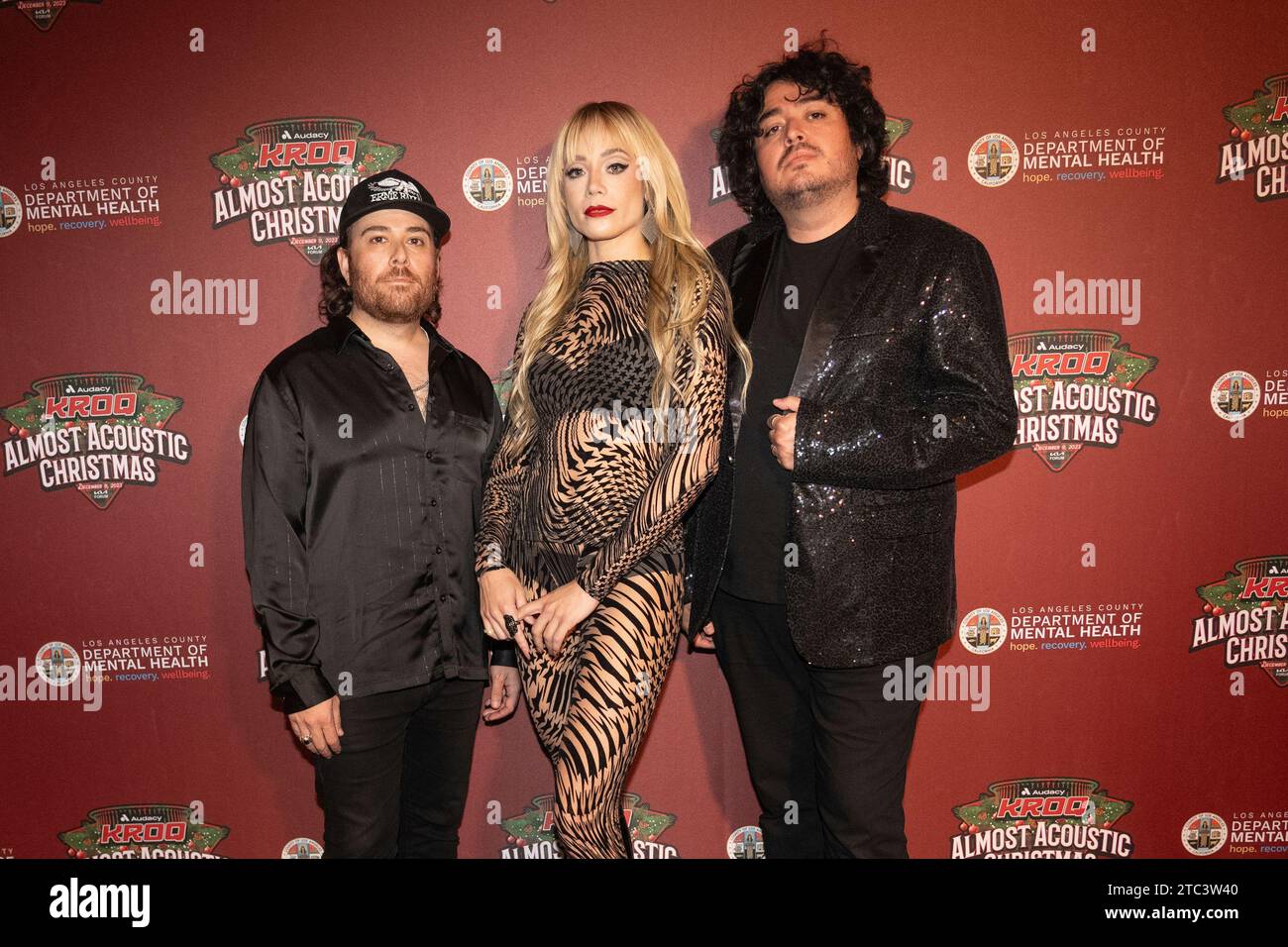 Ryan Clapham, left, Michelle Joy, and Paul Davis of Cannons pose during ...