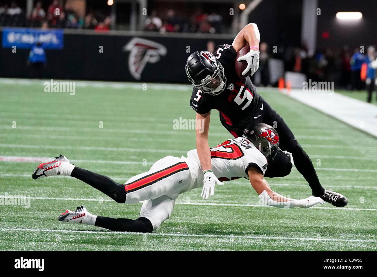 Atlanta Falcons wide receiver Drake London (5) is stopped by Tampa Bay ...