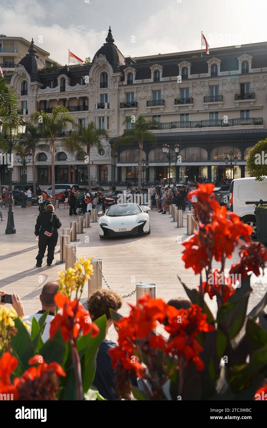 Monaco, Monte-Carlo, 22 October 2022: Square Casino Monte-Carlo at sunset, luxury cars, famous ...
